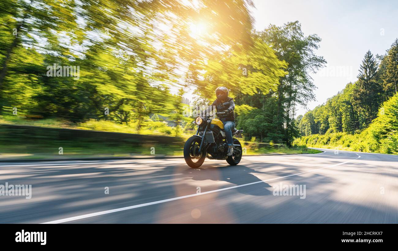 Man riding cafe racer motorcycle hi-res stock photography and images ...