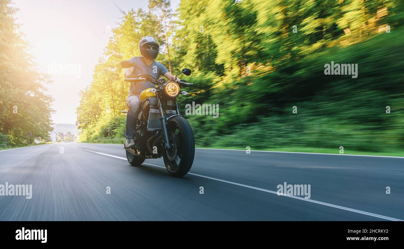 Man riding cafe racer motorcycle hi-res stock photography and images ...