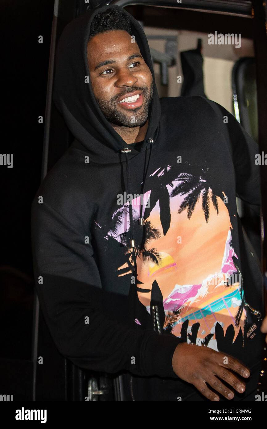 Jason Derulo is seen in a car smiling at the people after arriving at ...