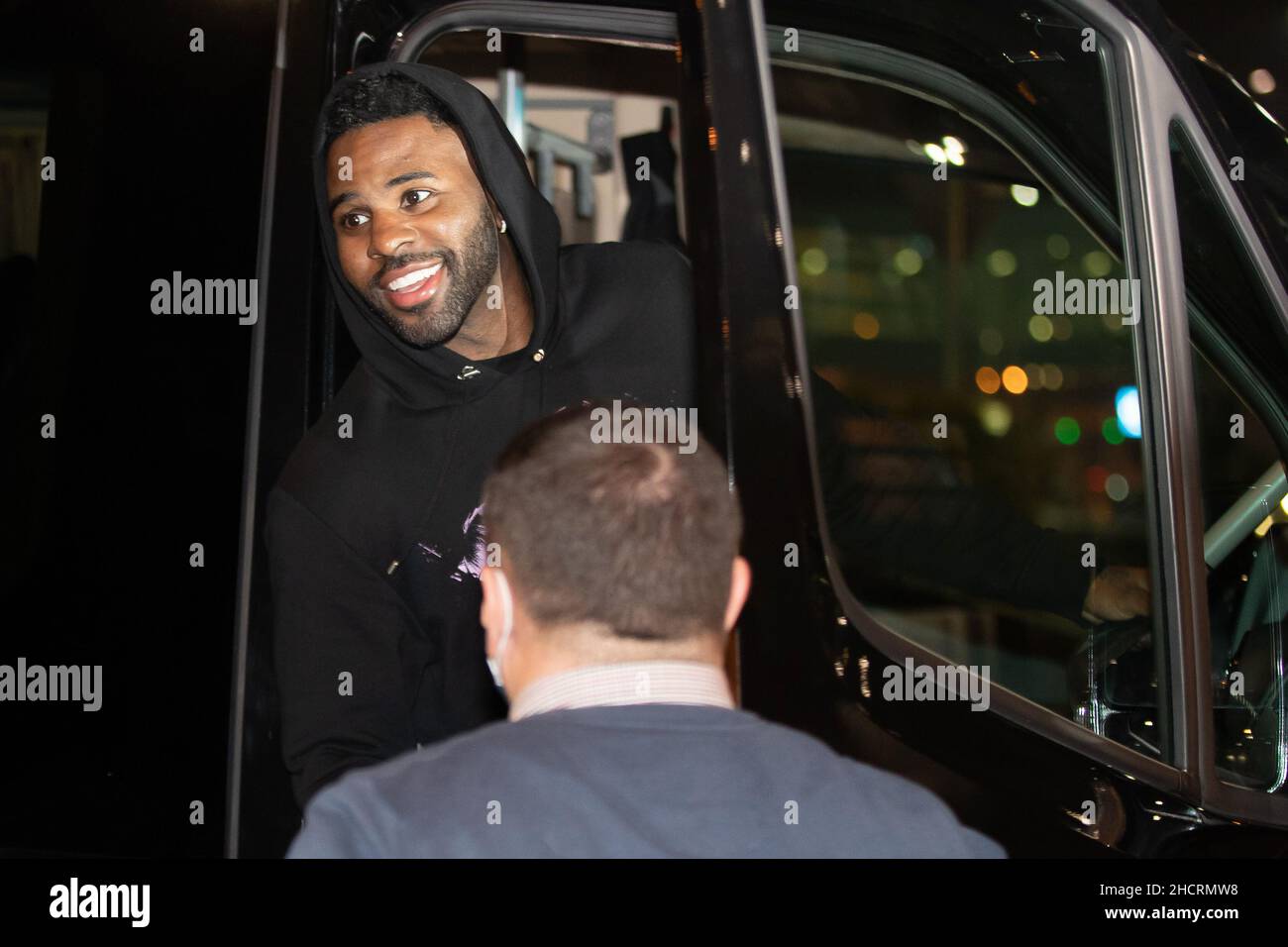 Jason Derulo is seen in a car smiling at the people after arriving at ...