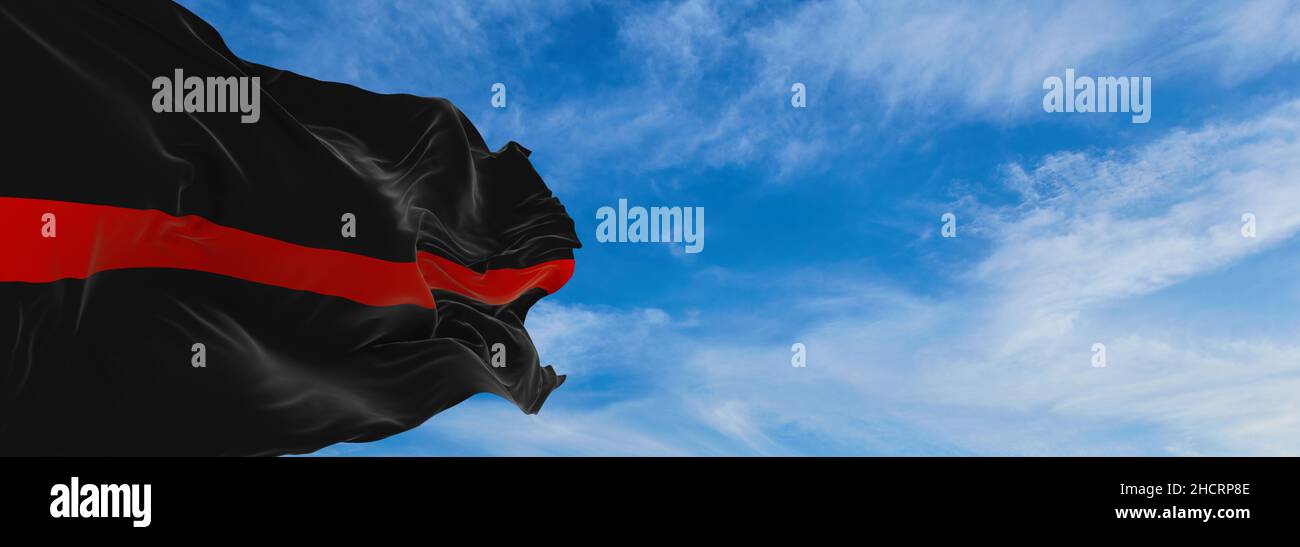 Thin Red Line flag waving at cloudy sky background on sunset, panoramic ...