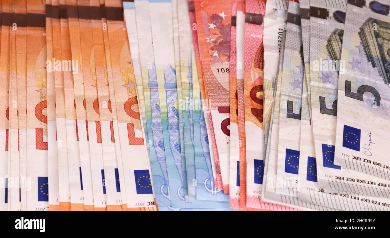 Close up of numerous euro banknotes lying on top of each other Stock ...
