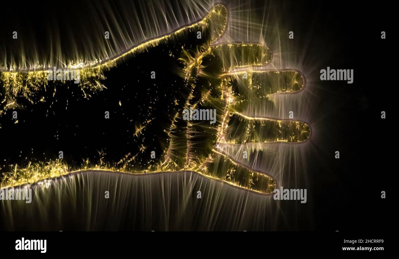3D-Illustration of a glowing human male hand with a kirlian aura ...