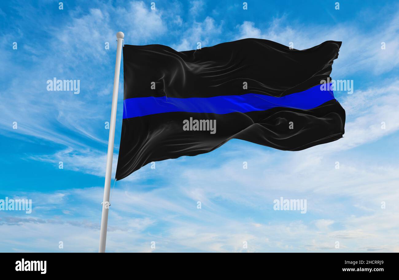 Thin Blue Line flag waving at cloudy sky background on sunset ...