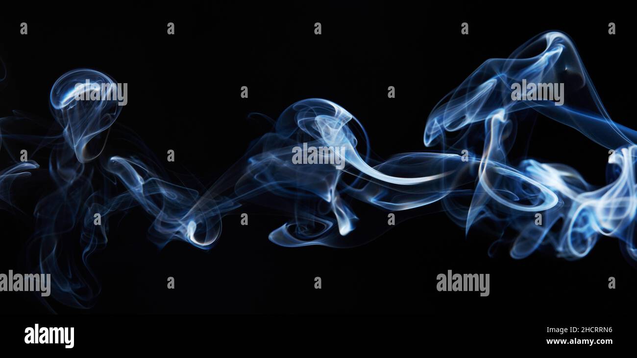 blue smoke on black background with abstract blur motion wave swirl ...