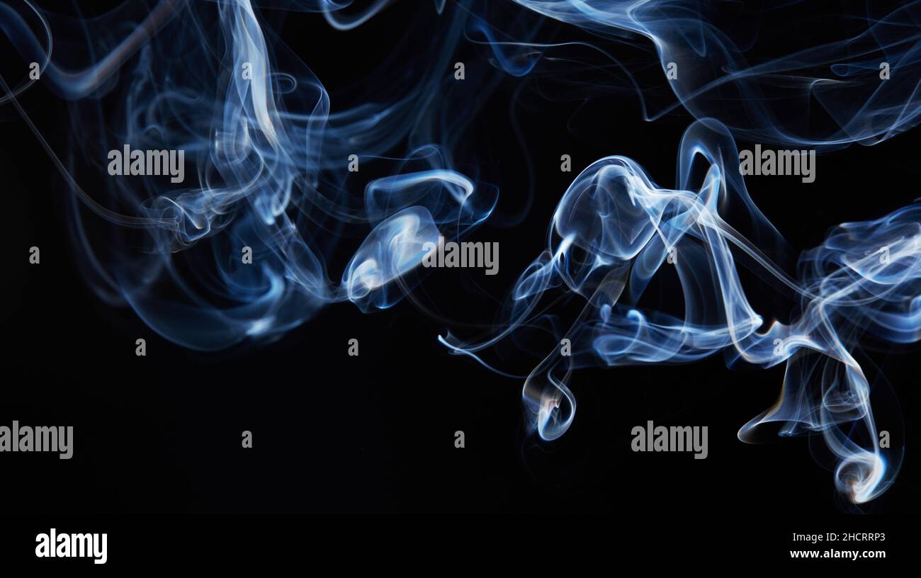 blue smoke on black background with abstract blur motion wave swirl ...