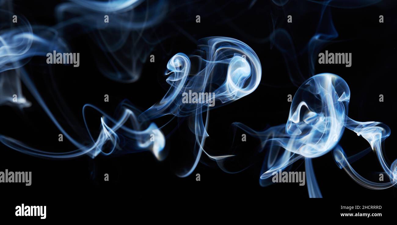 blue smoke on black background with abstract blur motion wave swirl ...