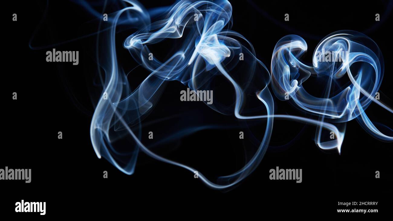 blue smoke on black background with abstract blur motion wave swirl ...