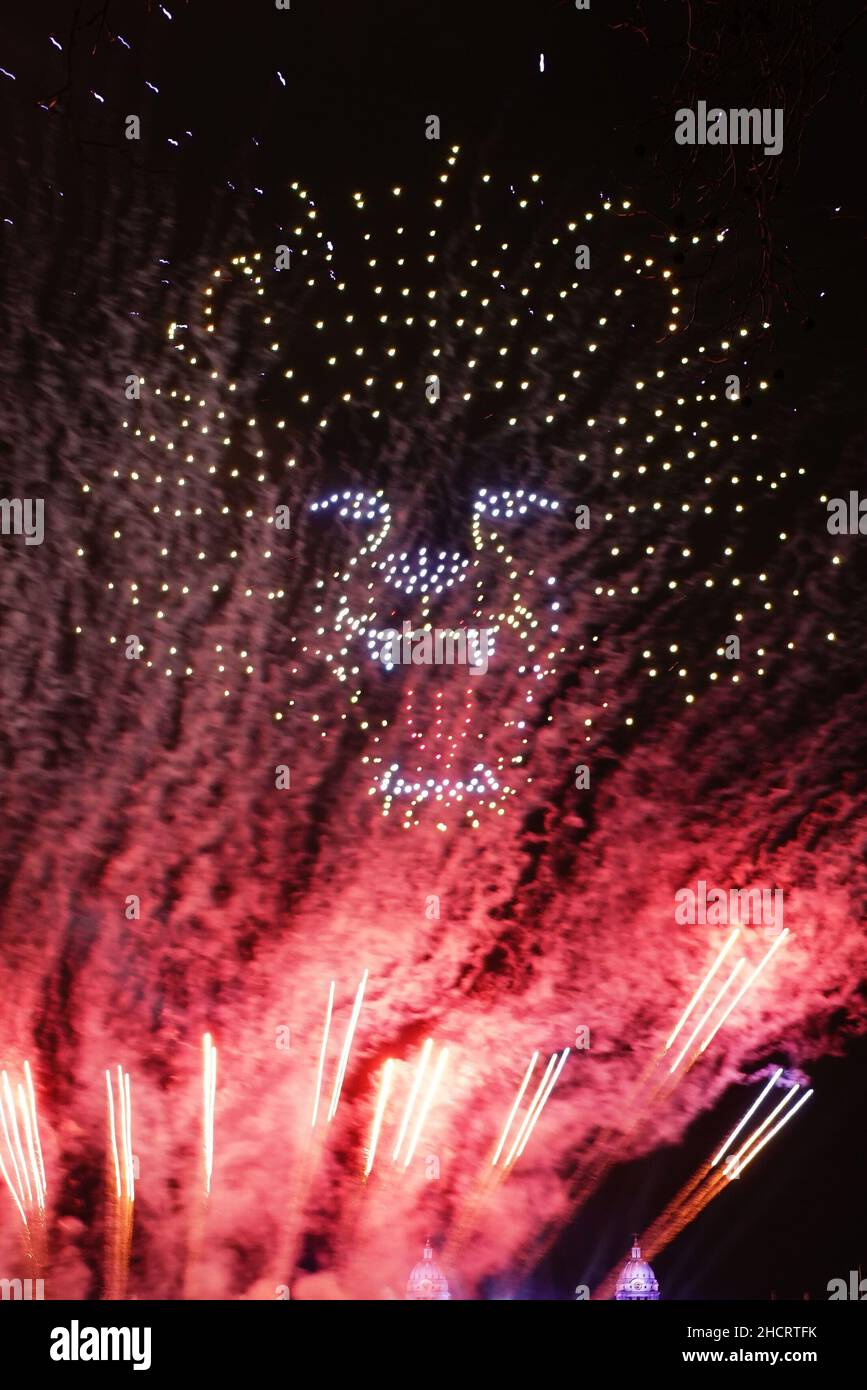 Drones and fireworks illuminate the night sky over the Old Royal Naval ...