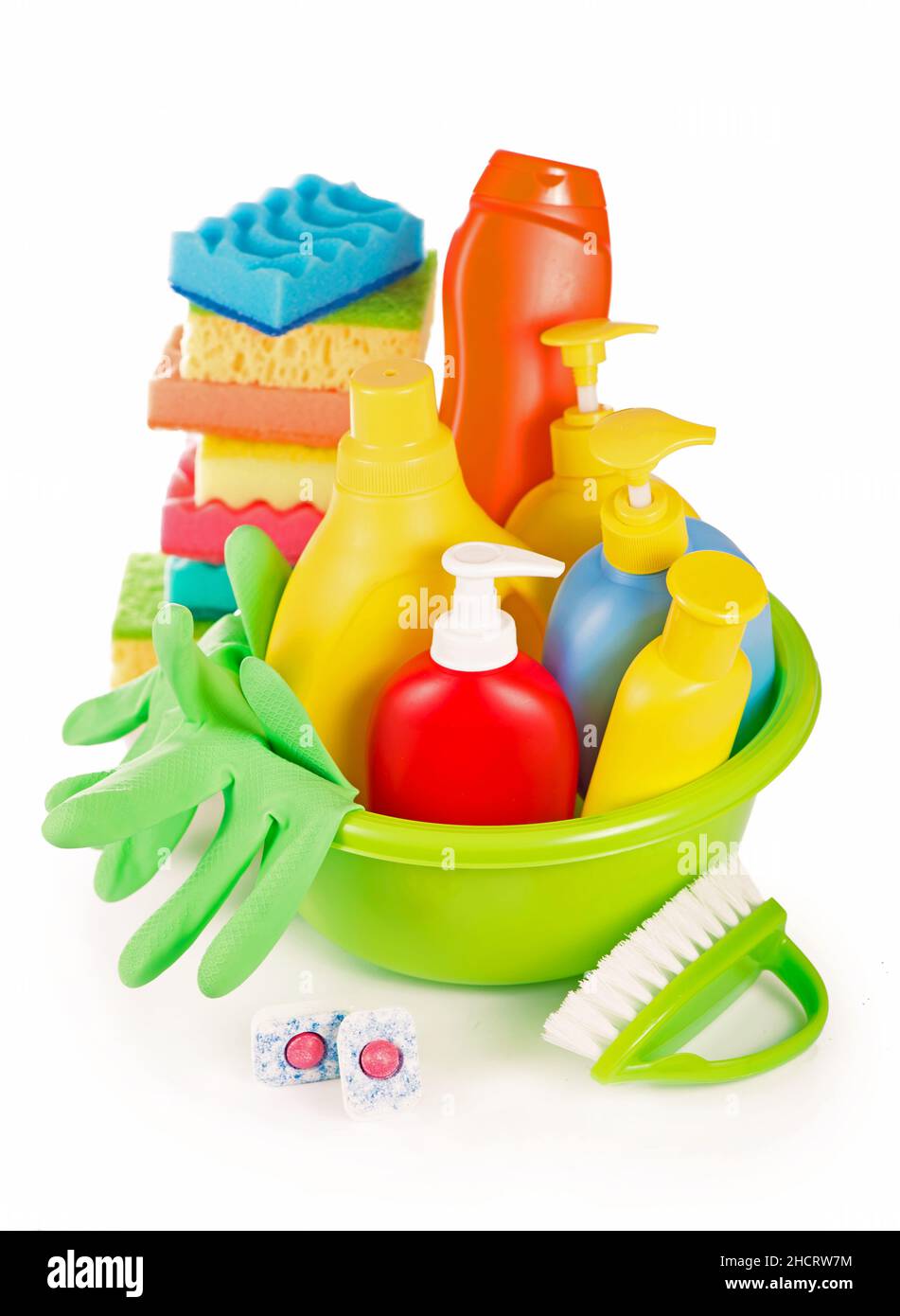 Household cleaning products and accessories in basket with detergent ...