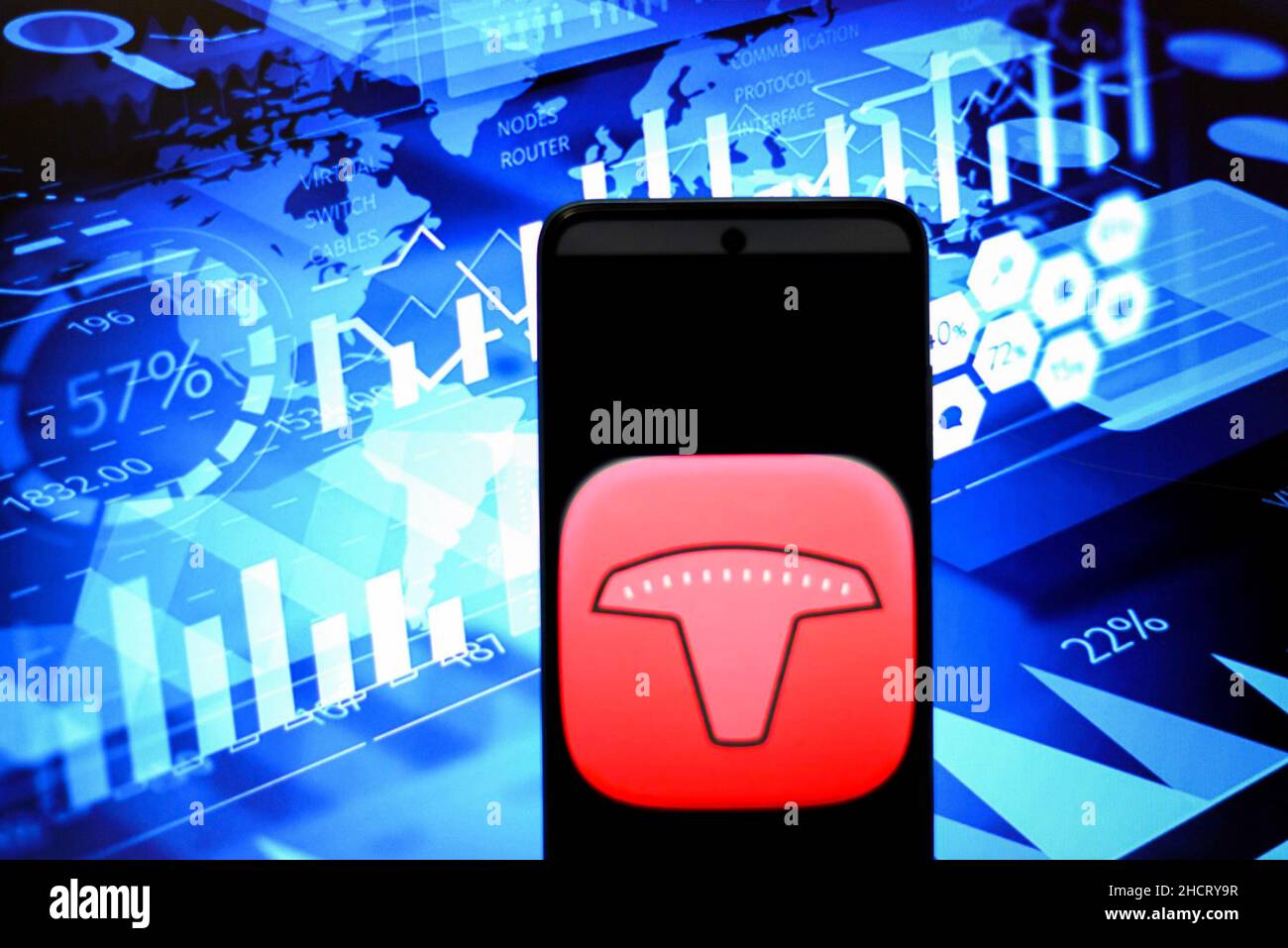 India. 31st Dec, 2021. In this photo illustration a Tesla car logo seen ...