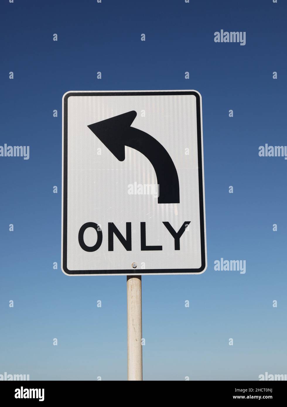 Blue left turn only sign hi-res stock photography and images - Alamy
