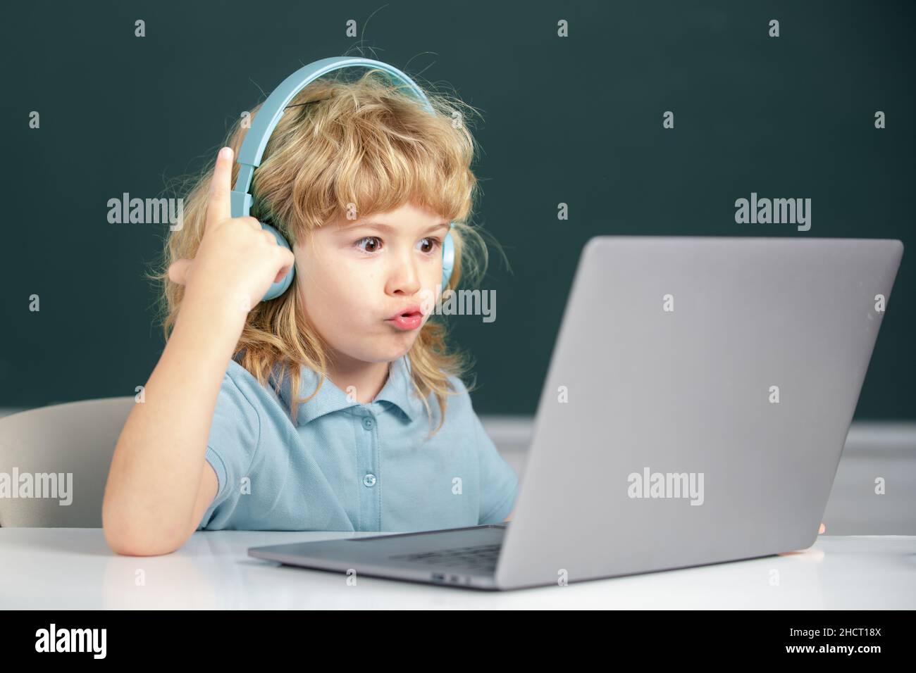 Student using headphone in classroom hi-res stock photography and ...