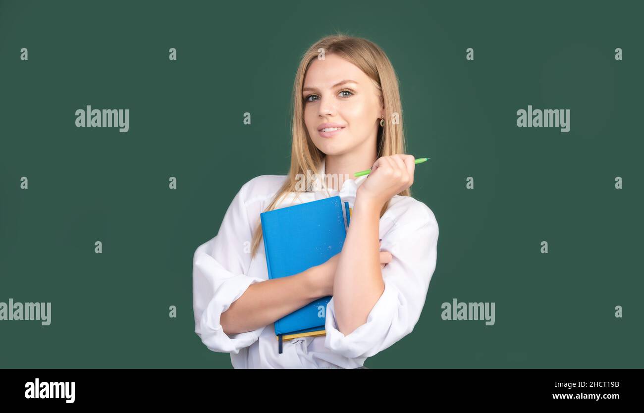 Student preparing exam and learning lessons in school classroom ...