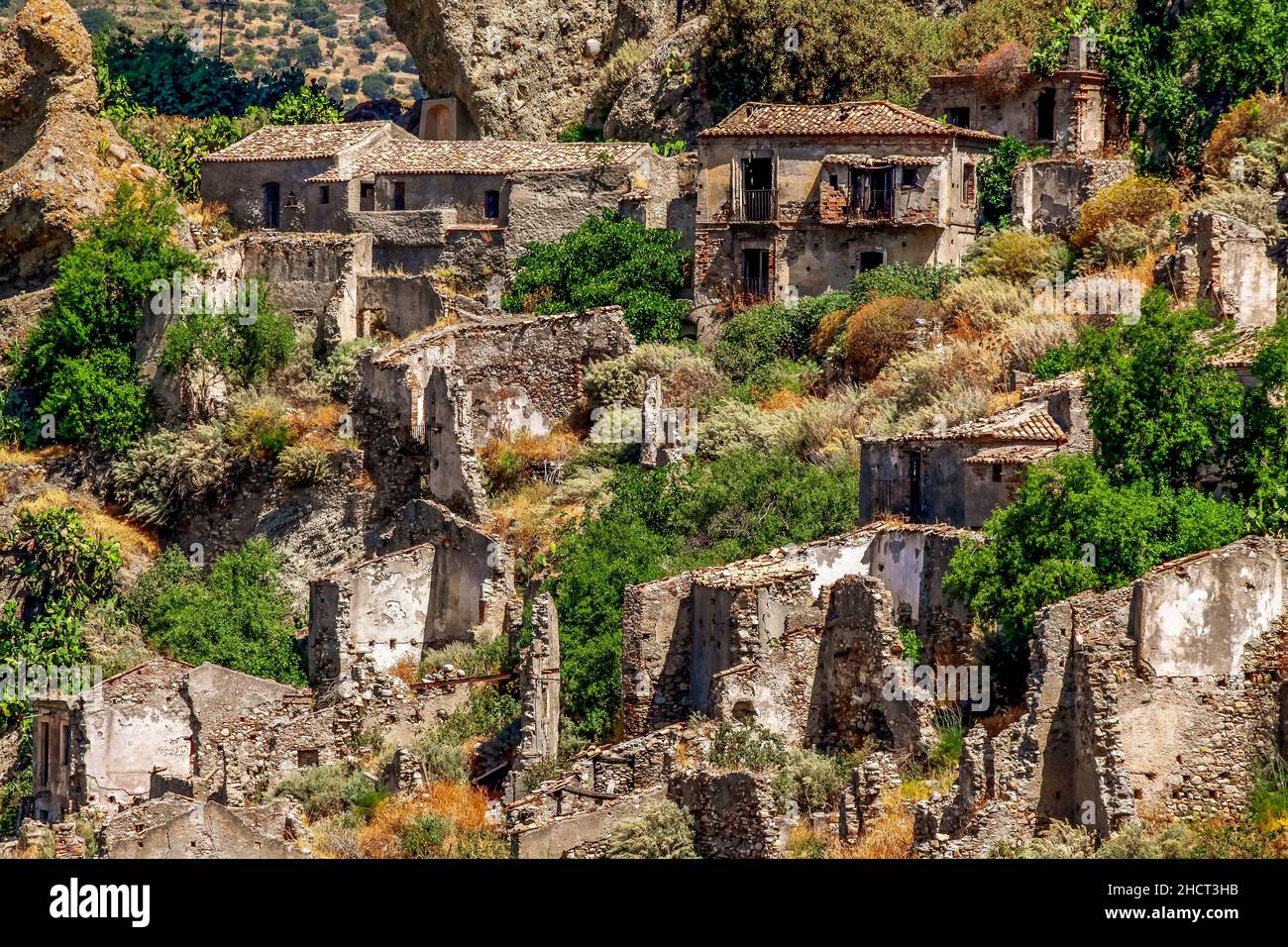 Small village of Pentedattilo, church and ruins of the abandoned ...