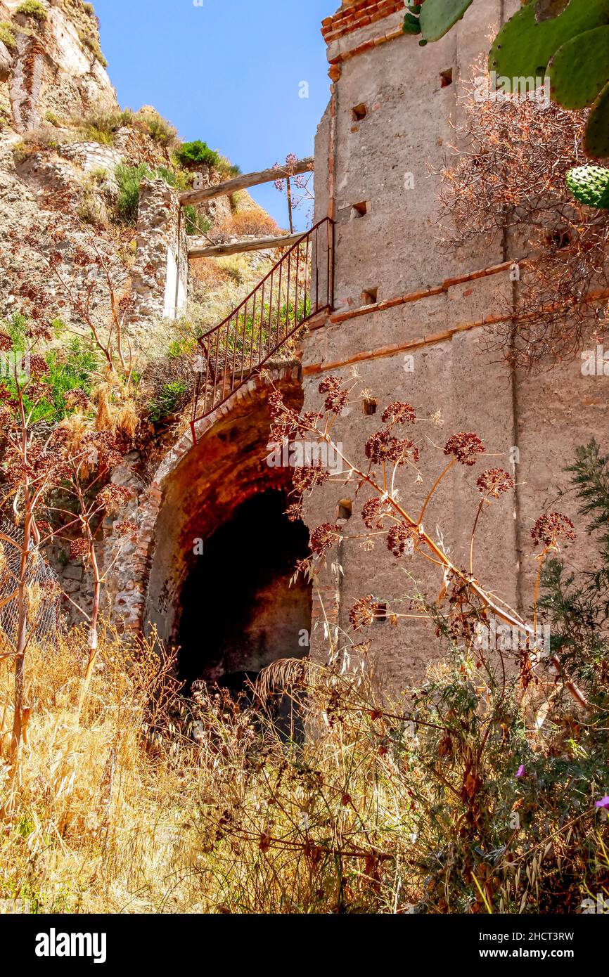 Small village of Pentedattilo, church and ruins of the abandoned ...