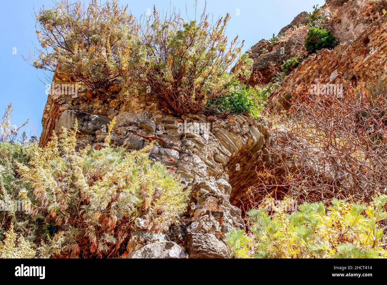 Small village of Pentedattilo, church and ruins of the abandoned ...