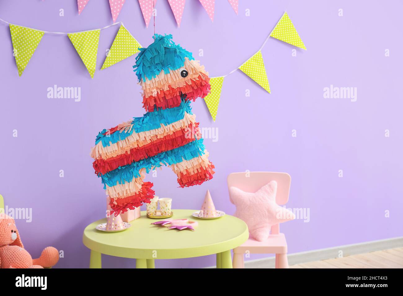 Mexican pinata hanging in children's room decorated for Birthday party ...