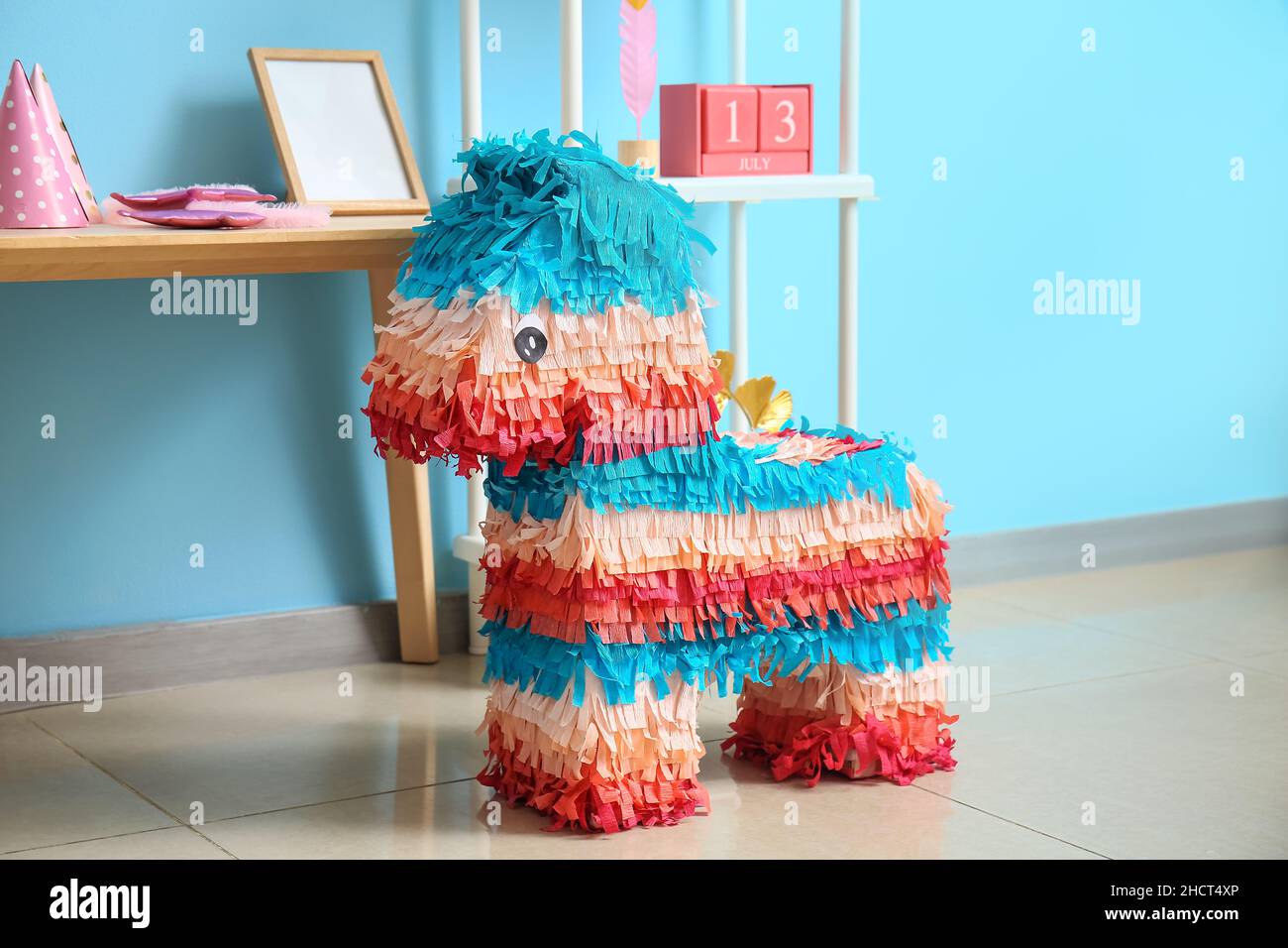 Mexican pinata in shape of horse in stylish room Stock Photo - Alamy