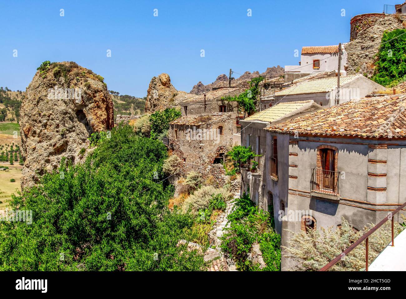 Small village of Pentedattilo, church and ruins of the abandoned ...