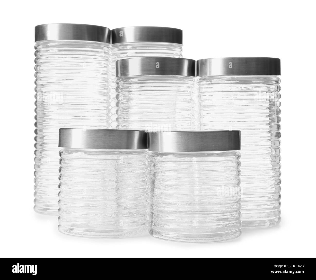 Many glass jars on white background Stock Photo - Alamy