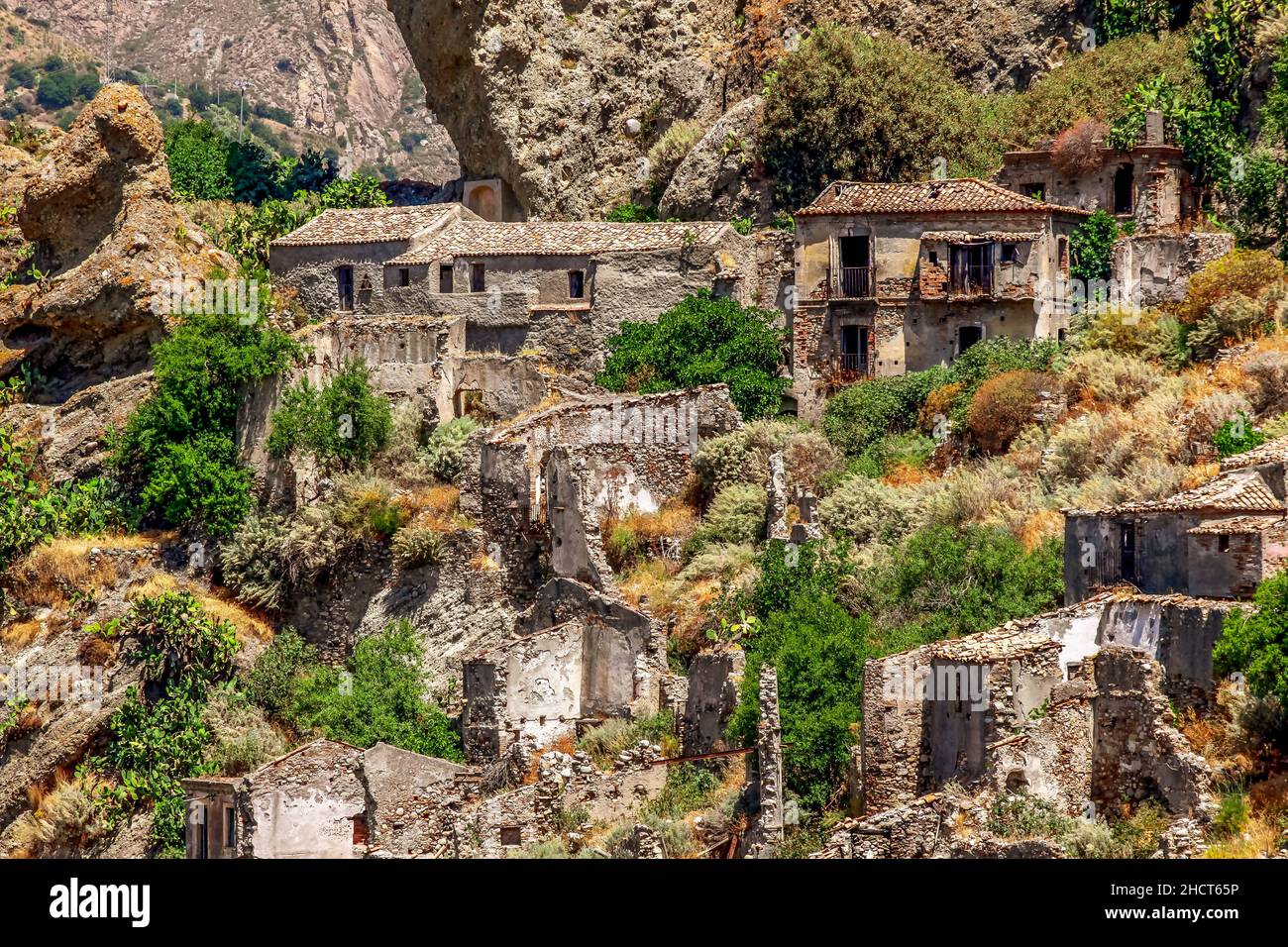 Small village of Pentedattilo, church and ruins of the abandoned ...