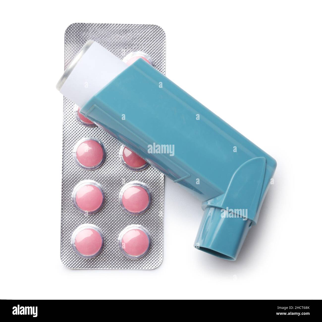 Asthma inhaler and blister pack of pills on white background Stock ...