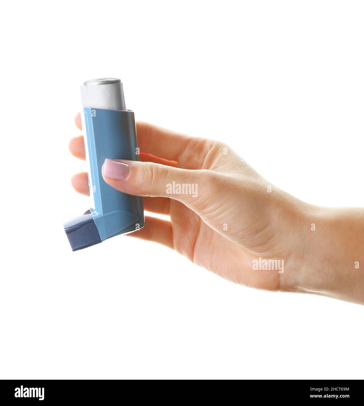 Female hand with modern asthma inhaler on white background Stock Photo ...