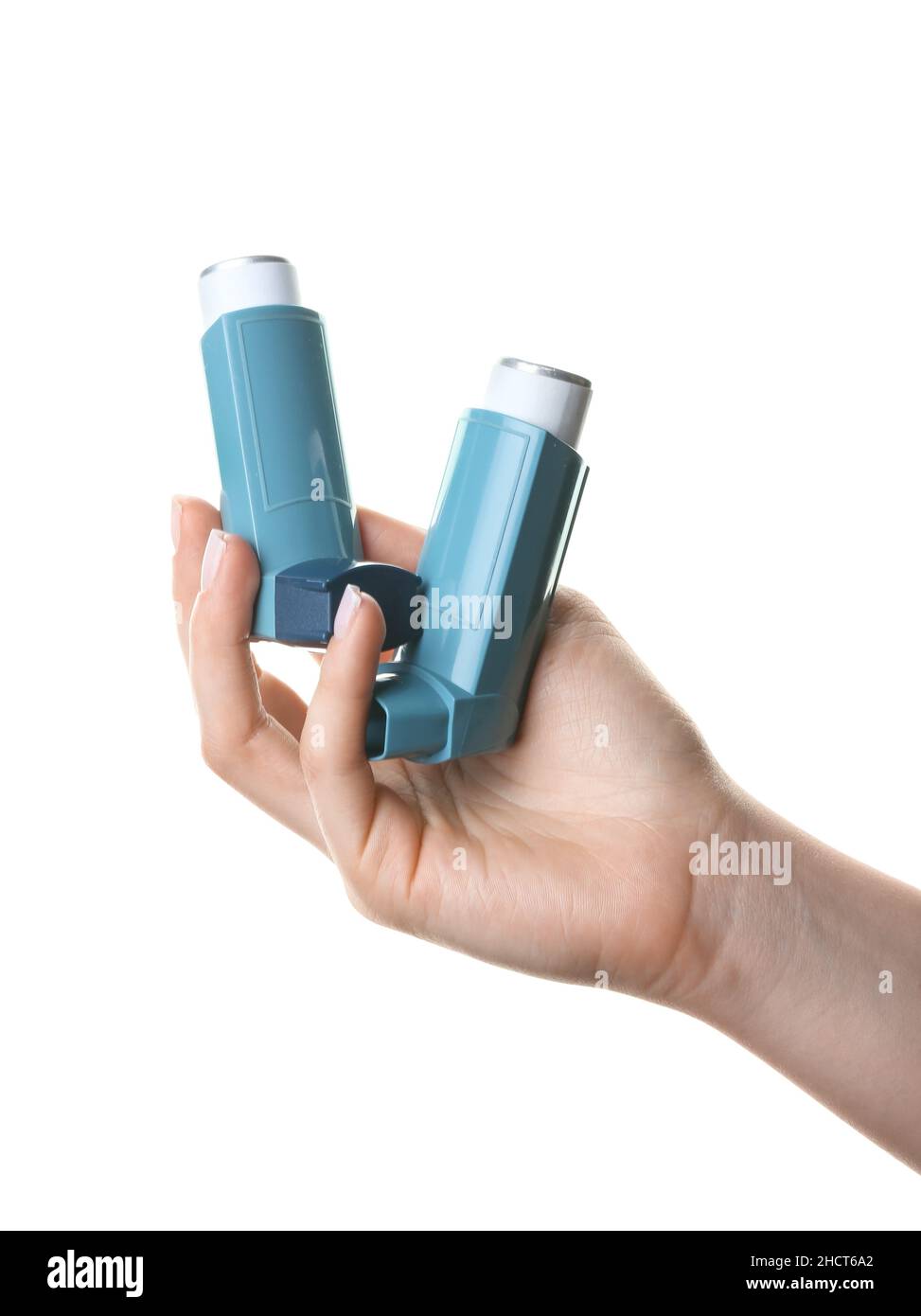 Female hand with modern asthma inhalers on white background Stock Photo ...