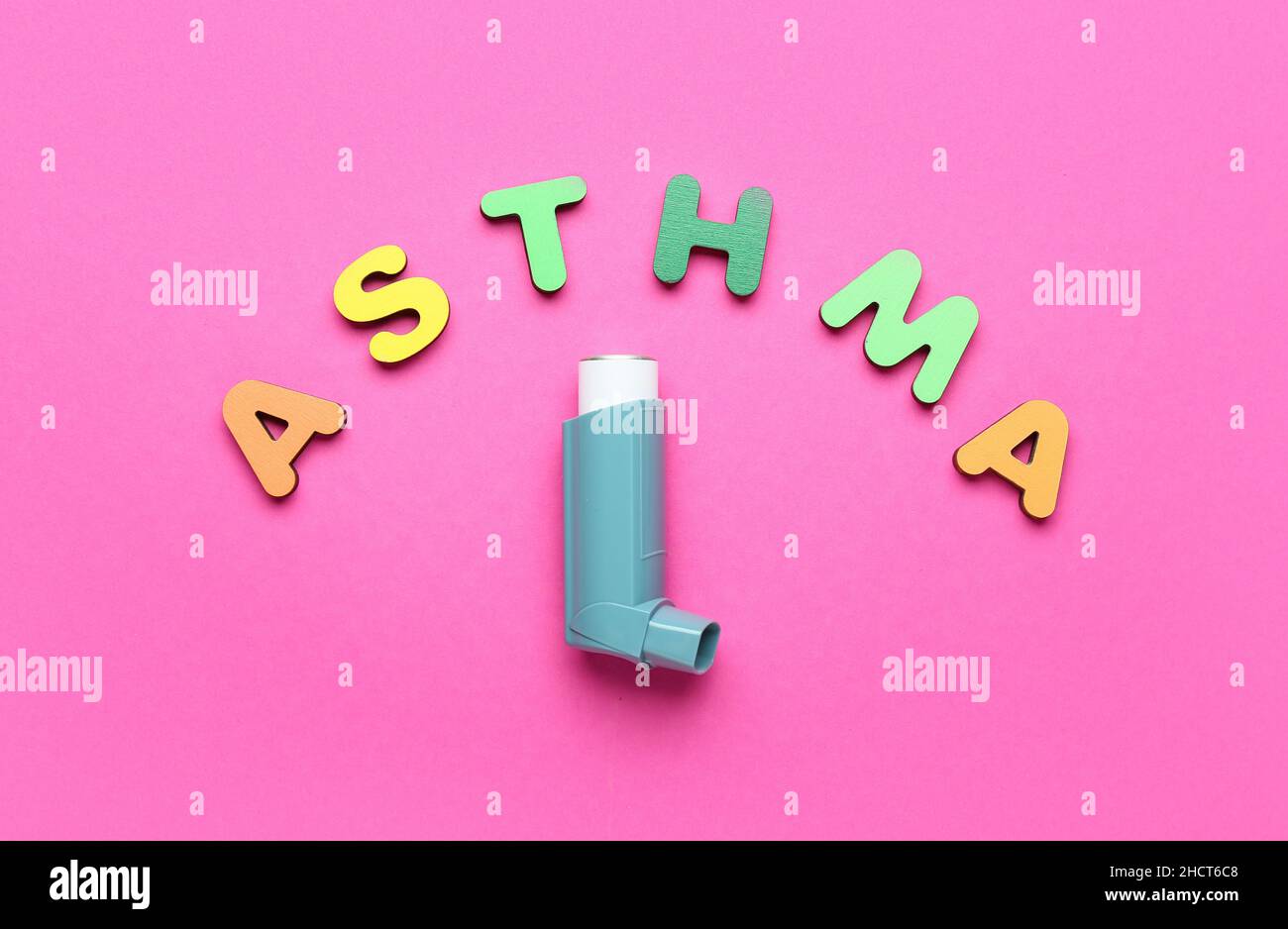Word ASTHMA and modern inhaler on color background Stock Photo - Alamy