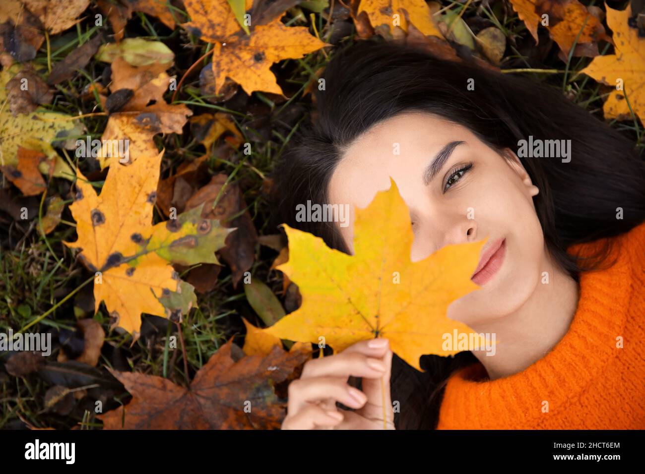 Woman lying on the ground top view hi-res stock photography and images ...