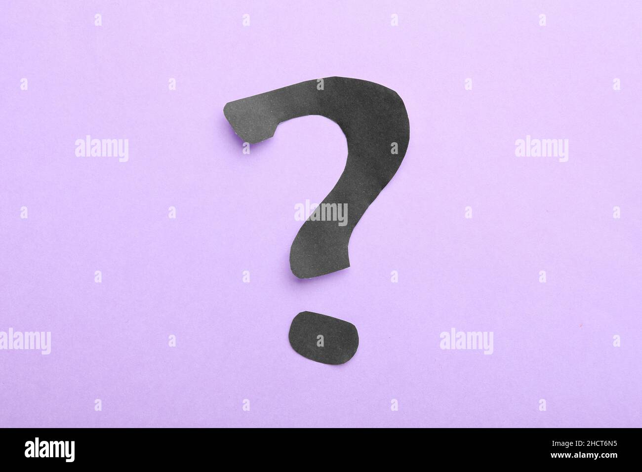 Question mark made of black paper on lilac background Stock Photo - Alamy