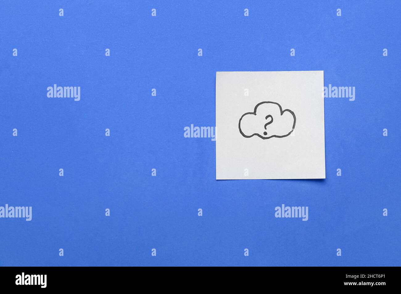 Sticky note with drawn cloud and question mark on blue background Stock ...