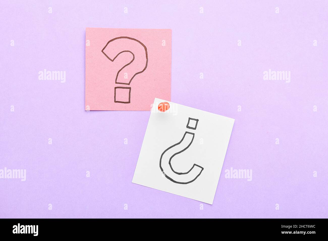 Sticky notes with question marks and pin on lilac background Stock ...