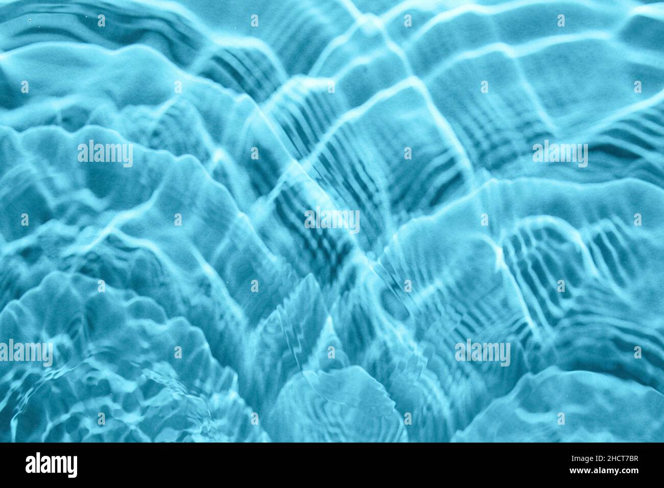 Surface of clean water with ripples Stock Photo - Alamy