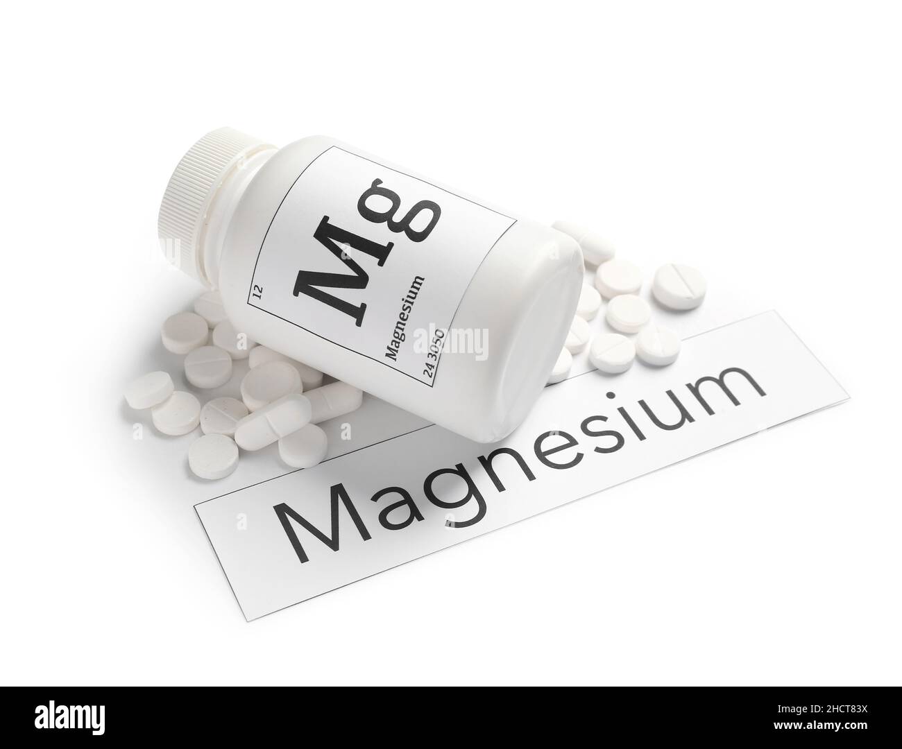 Bottle of pills and word MAGNESIUM isolated on white background Stock ...