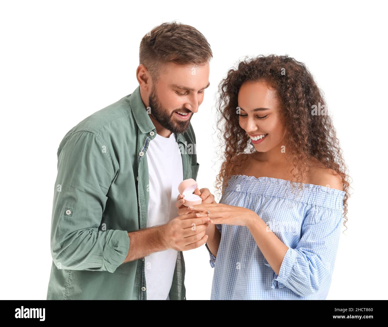 Putting ring wedding proposal on Cut Out Stock Images & Pictures - Alamy