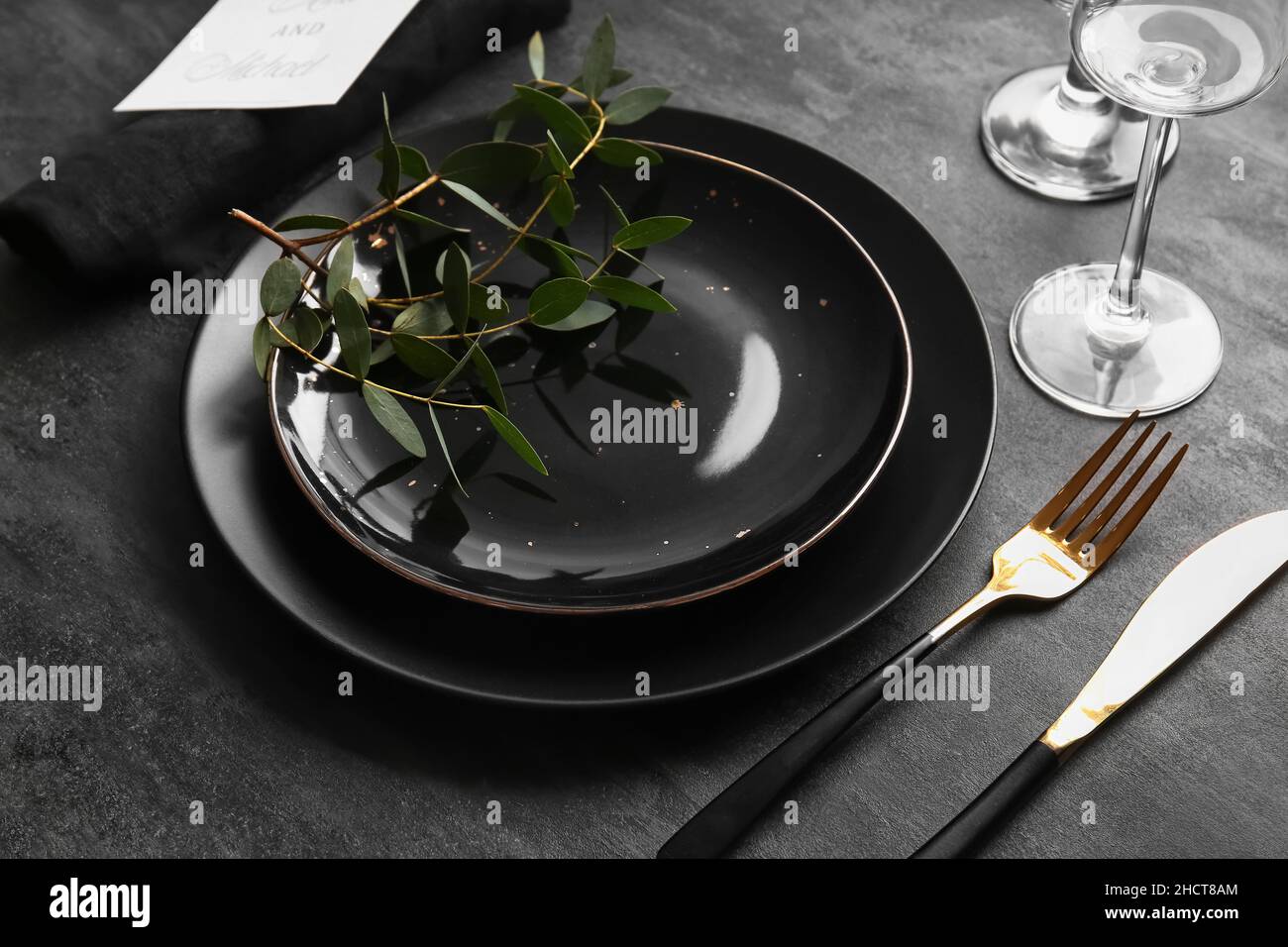 Beautiful table setting for wedding on black background Stock Photo - Alamy