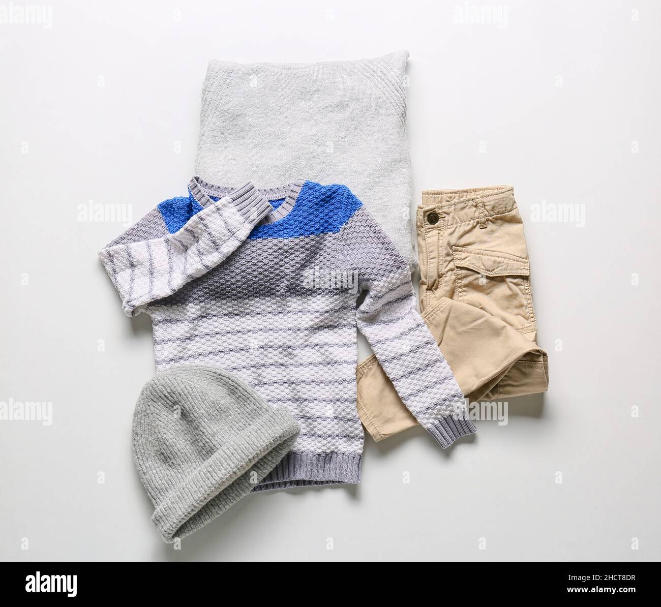 Set of children's clothes on white background Stock Photo - Alamy