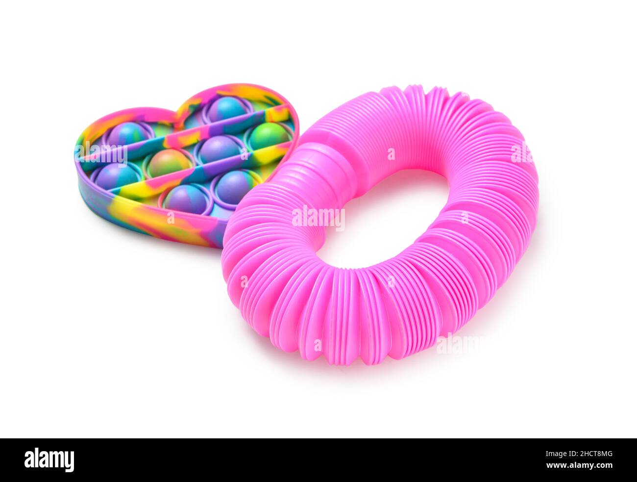 Colorful Pop Tube and Pop it fidget toy on white background Stock Photo ...