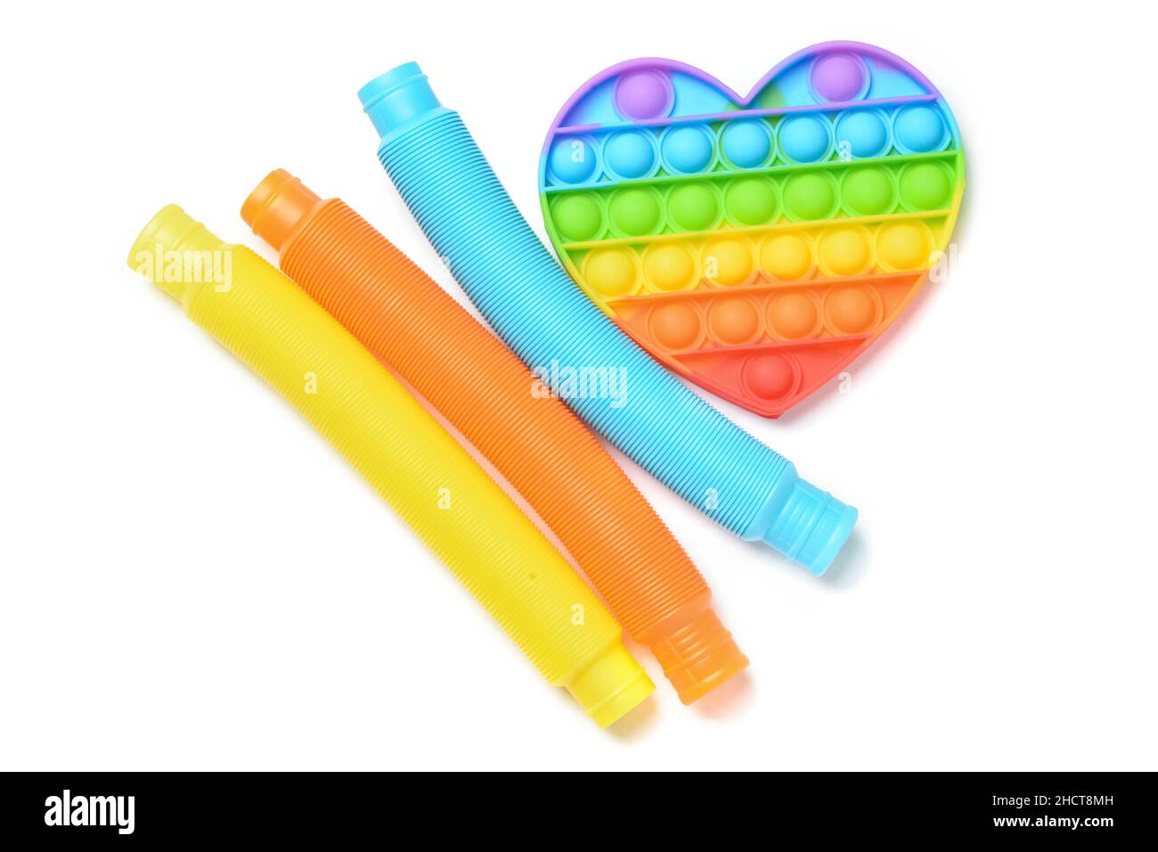 Colorful Pop Tubes and Pop it fidget toy on white background Stock ...