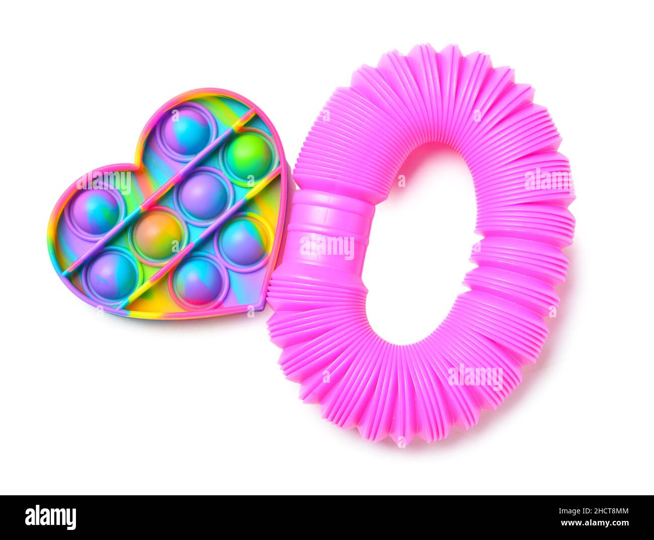 Colorful Pop Tube and Pop it fidget toy on white background Stock Photo ...