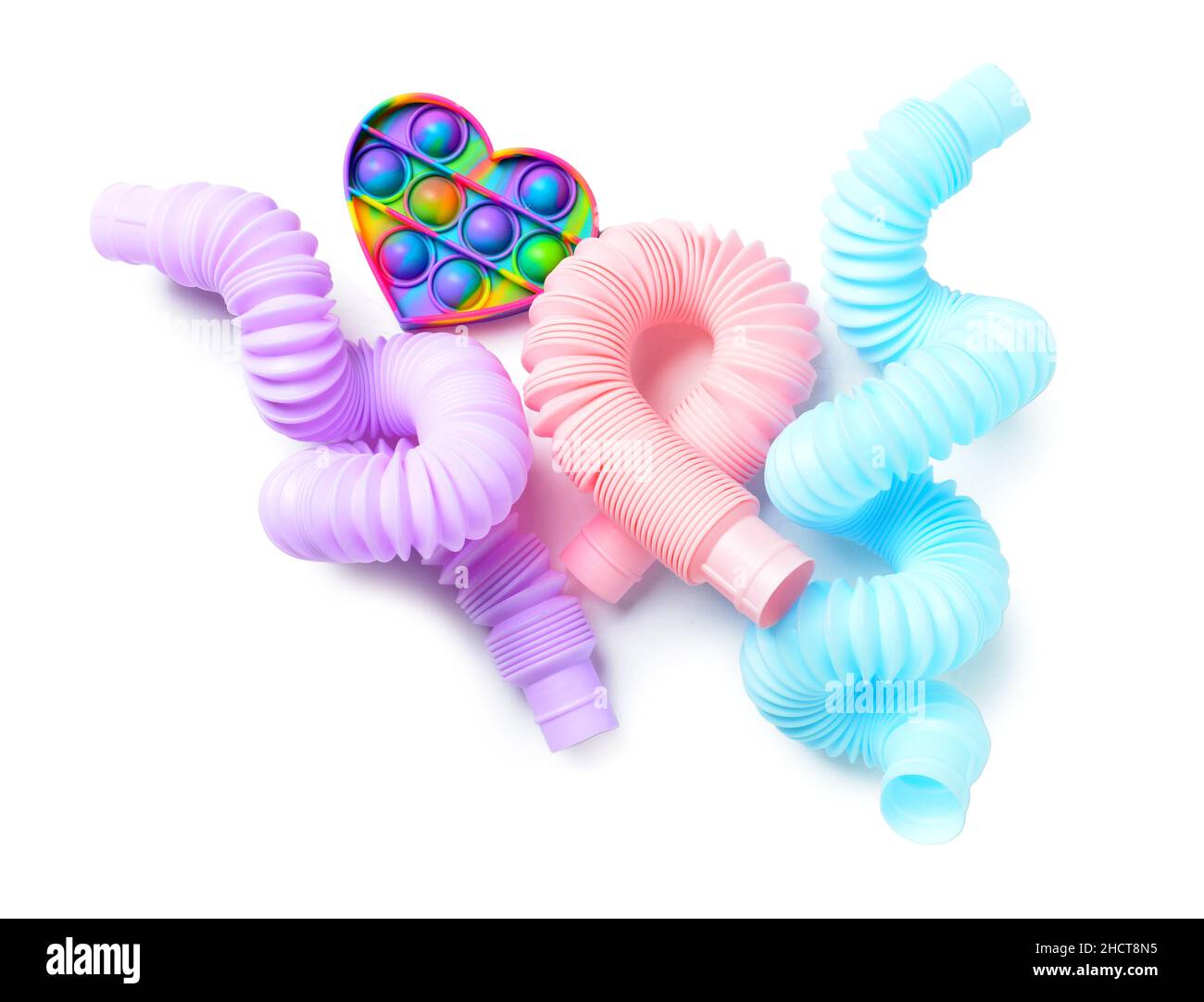 Colorful Pop Tubes and Pop it fidget toy on white background Stock ...
