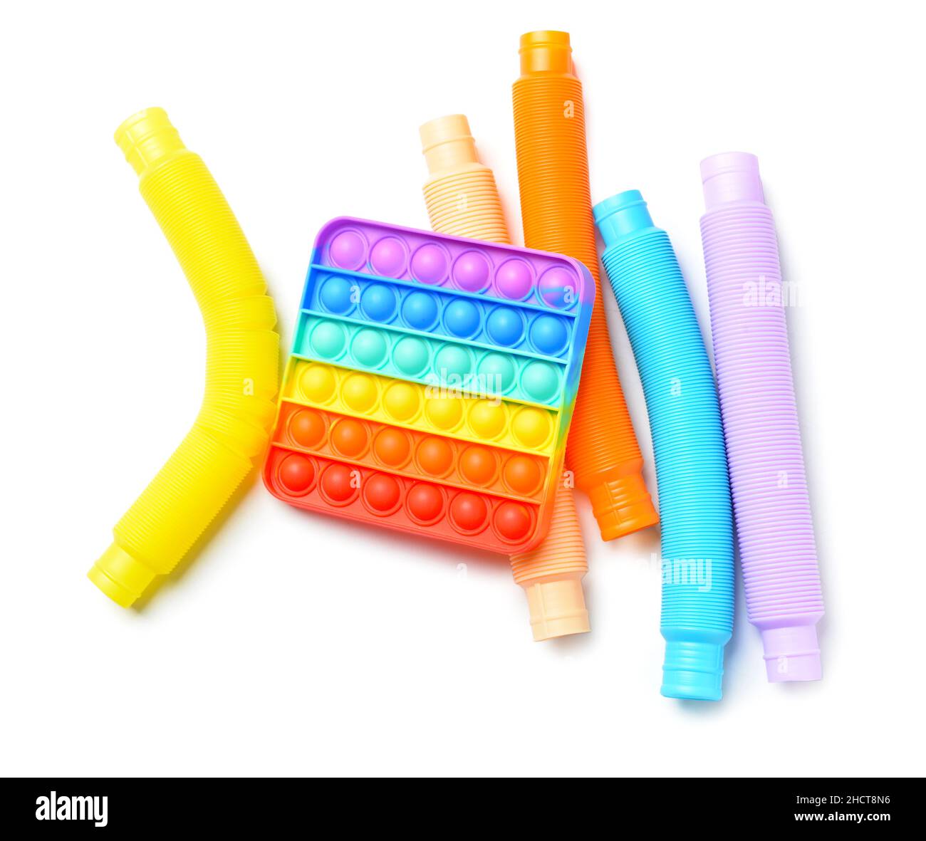 Colorful Pop Tubes and Pop it fidget toy on white background Stock ...