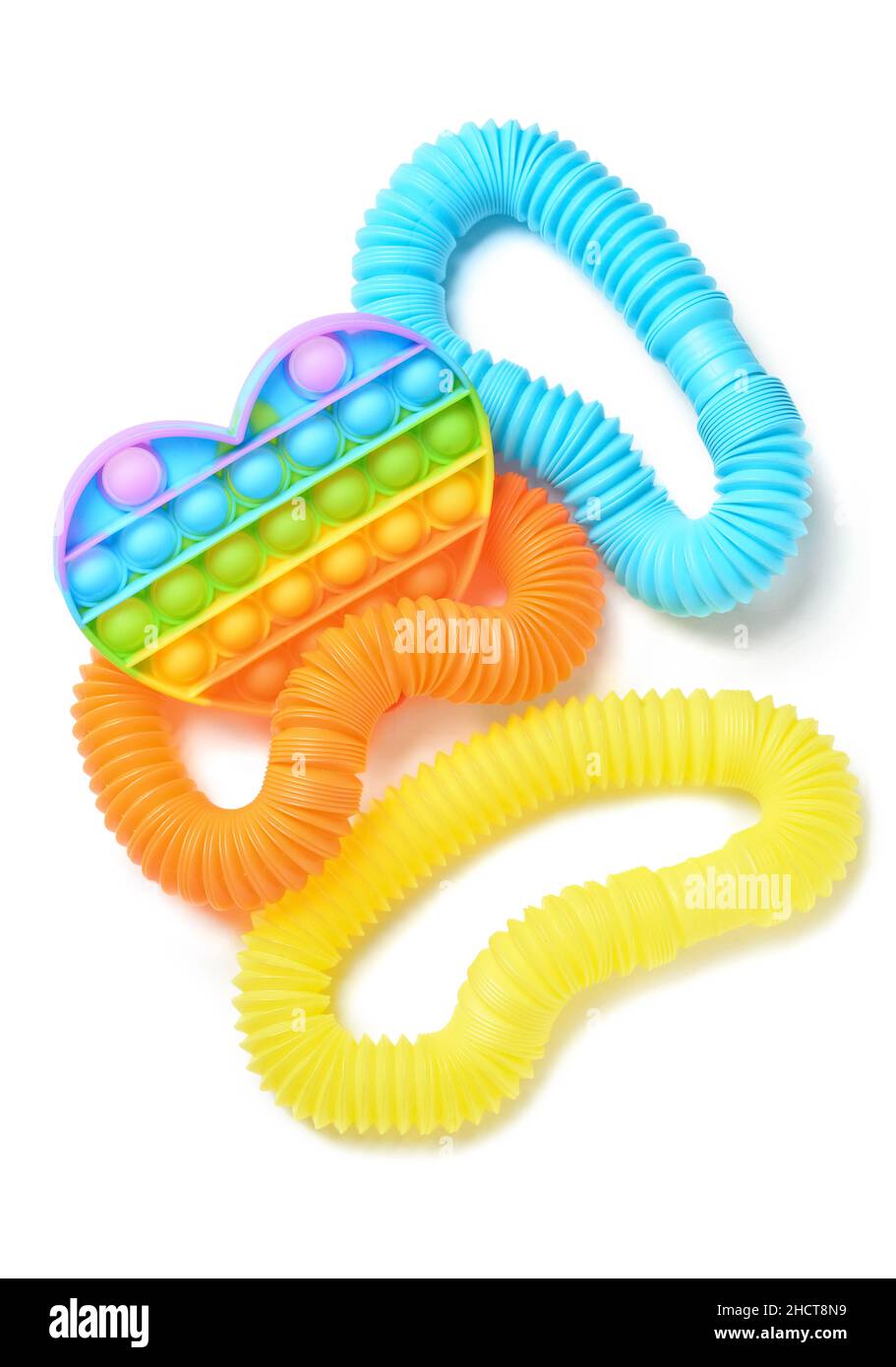 Colorful Pop Tubes and Pop it fidget toy on white background Stock ...