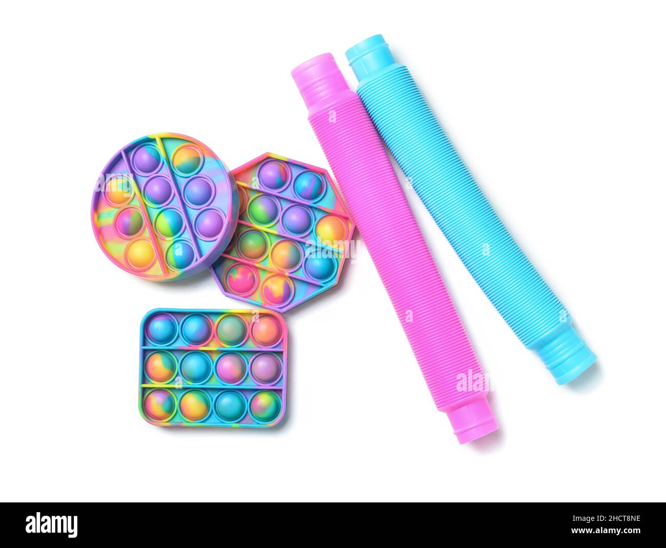 Colorful Pop Tubes and Pop it fidget toys on white background Stock ...