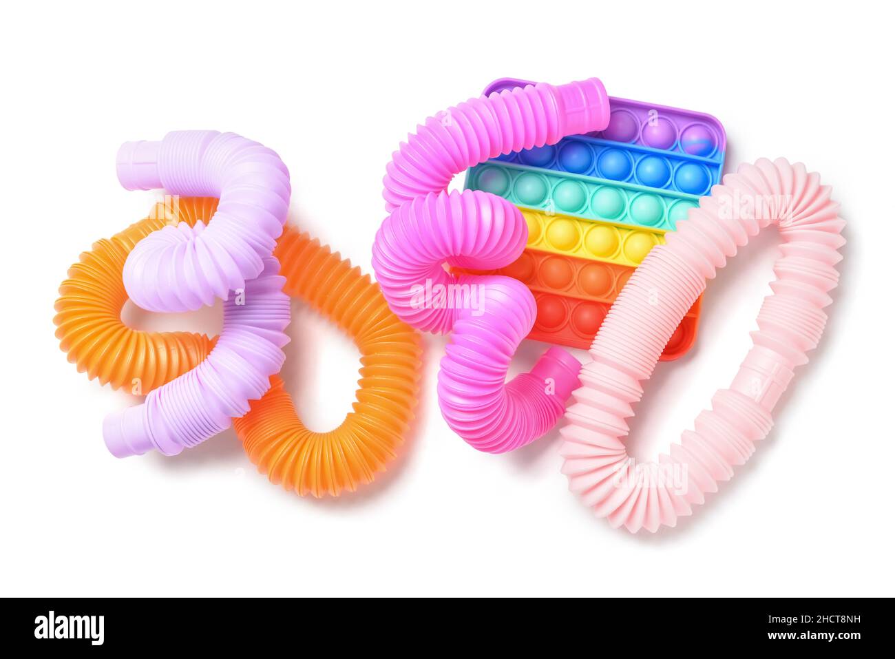 Colorful Pop Tubes and Pop it fidget toy on white background Stock ...
