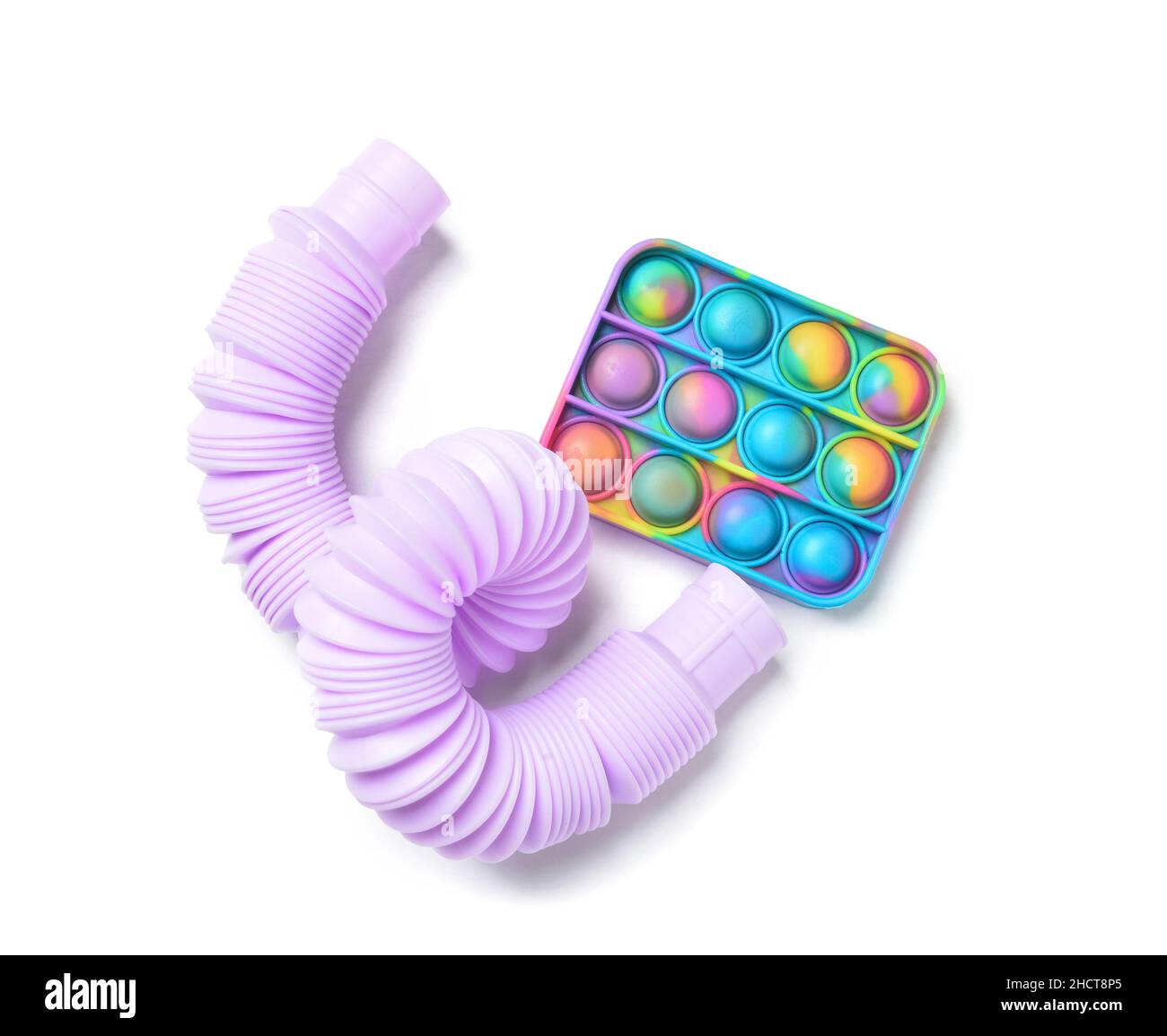 Colorful Pop Tube and Pop it fidget toy on white background Stock Photo ...