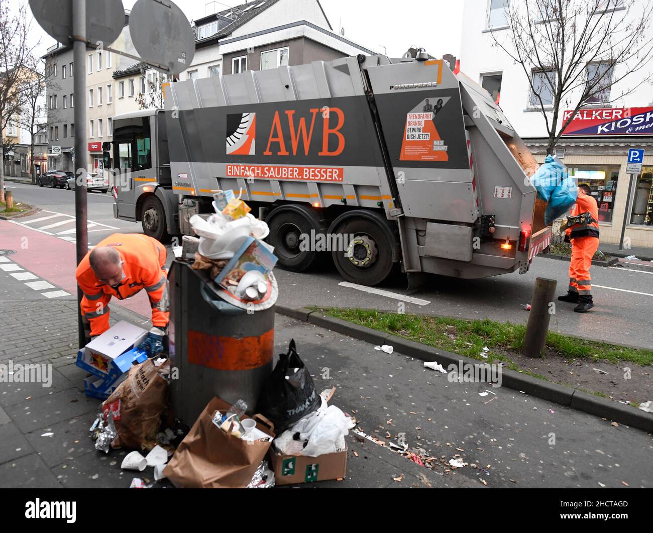 Cologne, Germany. 01st Jan, 2022. Employees of the city's waste ...