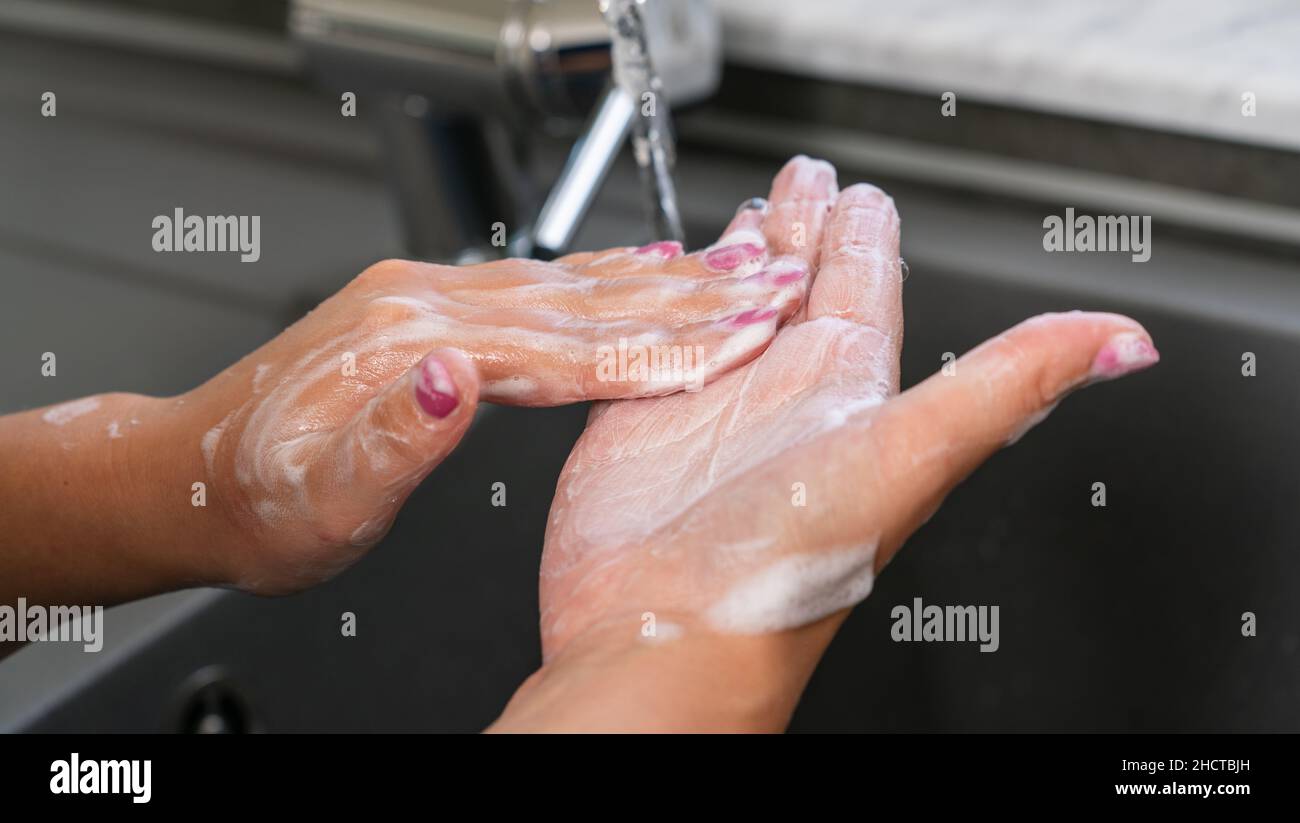 Hygiene. Woman Cleaning Hands. Washing hands with soap prevention for ...